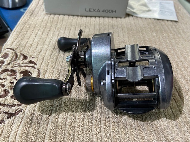 DAIWA LEXA 400H BAIT CASTING REEL RIGHT HAND GOOD CONDITION Ships Free ...