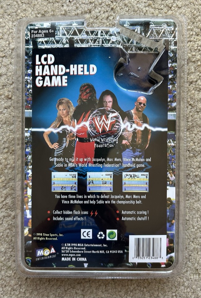 MGA ENTERTAIMENT WWF Stone Cold Steve Austin Handheld Electronic LCD ...