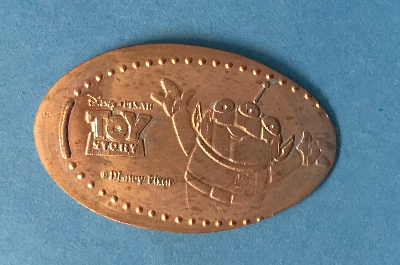 LITTLE GREEN MAN SQUEEZE ALIEN TOY STORY PRESSED PENNY DISNEY FREE SHIP ...