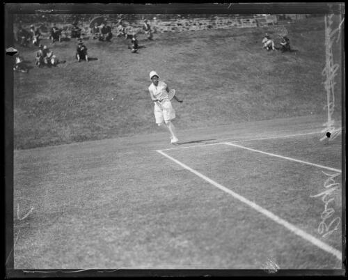 Champion tennis player Ms Esna Boyd running to return a volley, NS- Old ...