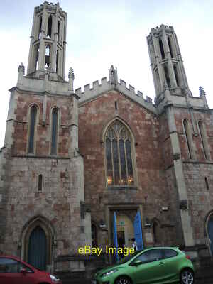 Photo 12x8 North entrance to the old St John the Evangelist church ...