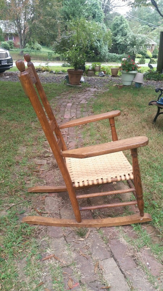 Woven splint seat oak rocker with pressed leaf & flower design on the ...