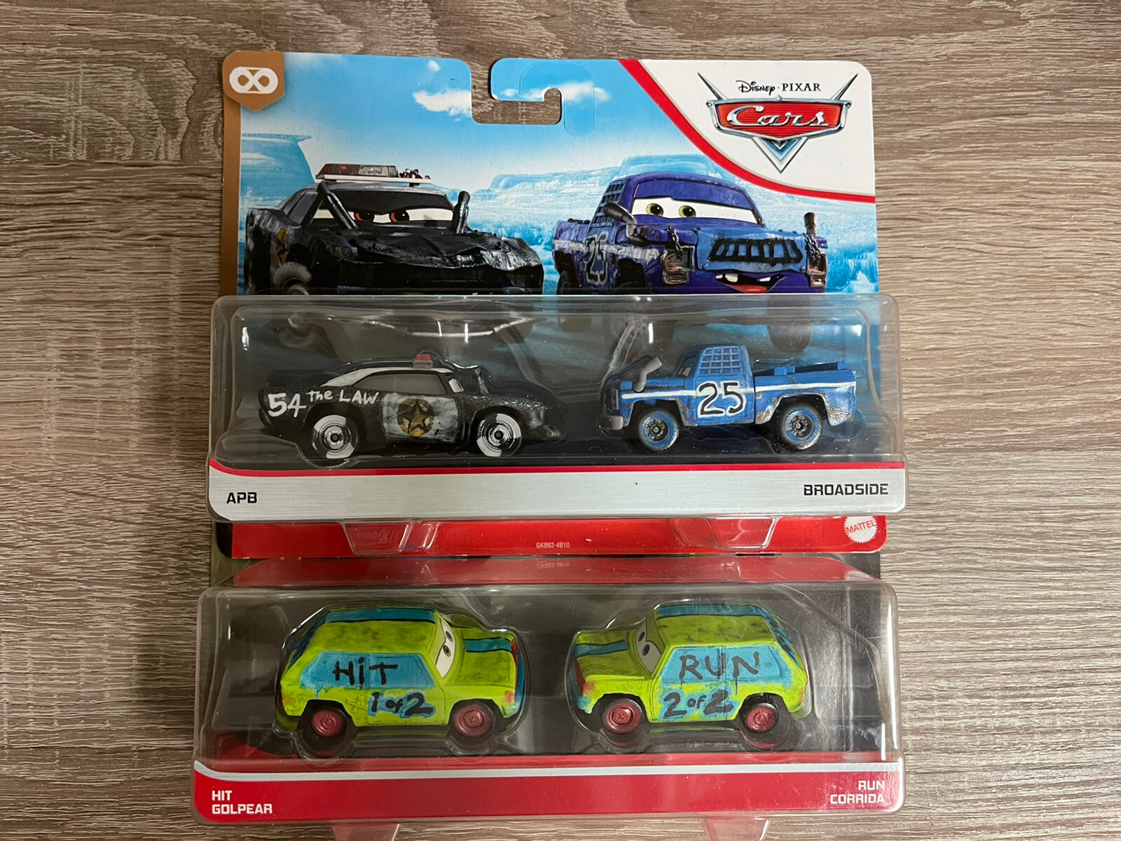 DISNEY PIXAR CARS 2-PACK APB/BROADSIDE & HIT GOLPEAR/RUN CORRIDA LOT OF ...