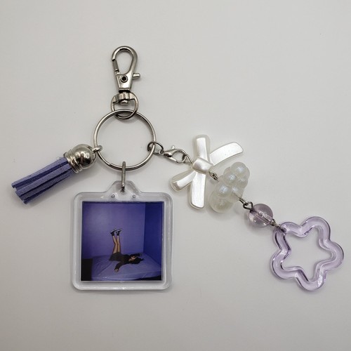 keychain double sided featuring alternative cover of Olivia Rodrigo's ...