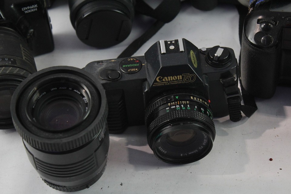 Assorted Vintage SLR Film Cameras w/ Some Manual / AF Lenses & Cases ...