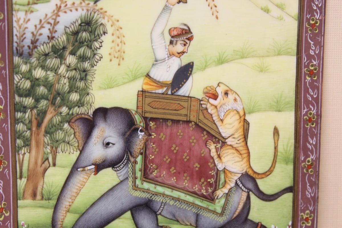 Lion Attacking Man On Elephant