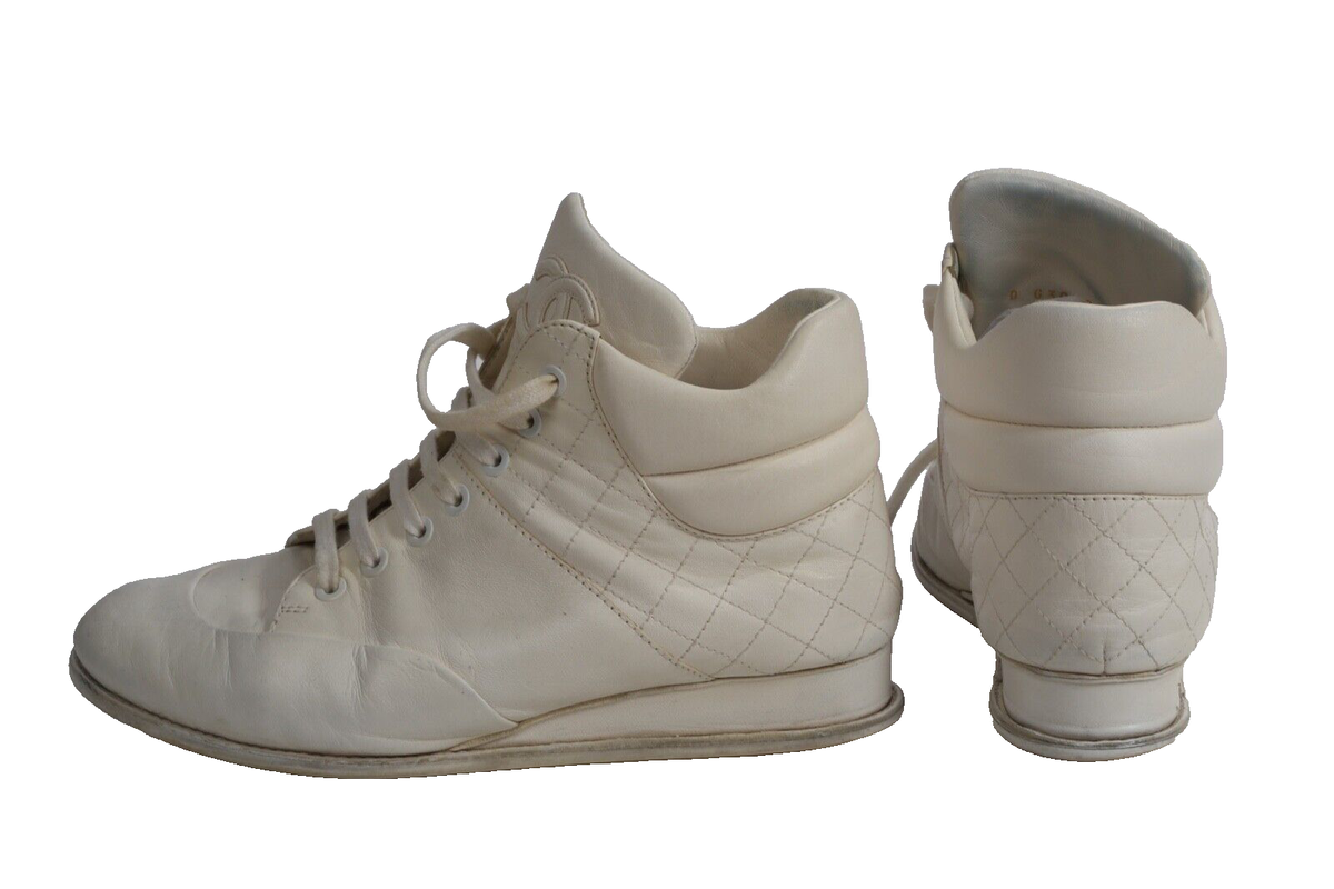 CHANEL CC Logo White Leather High Top Lace up Wedge Sneakers CHANEL CC Logo White Leather High Top Lace up Wedge Sneakers