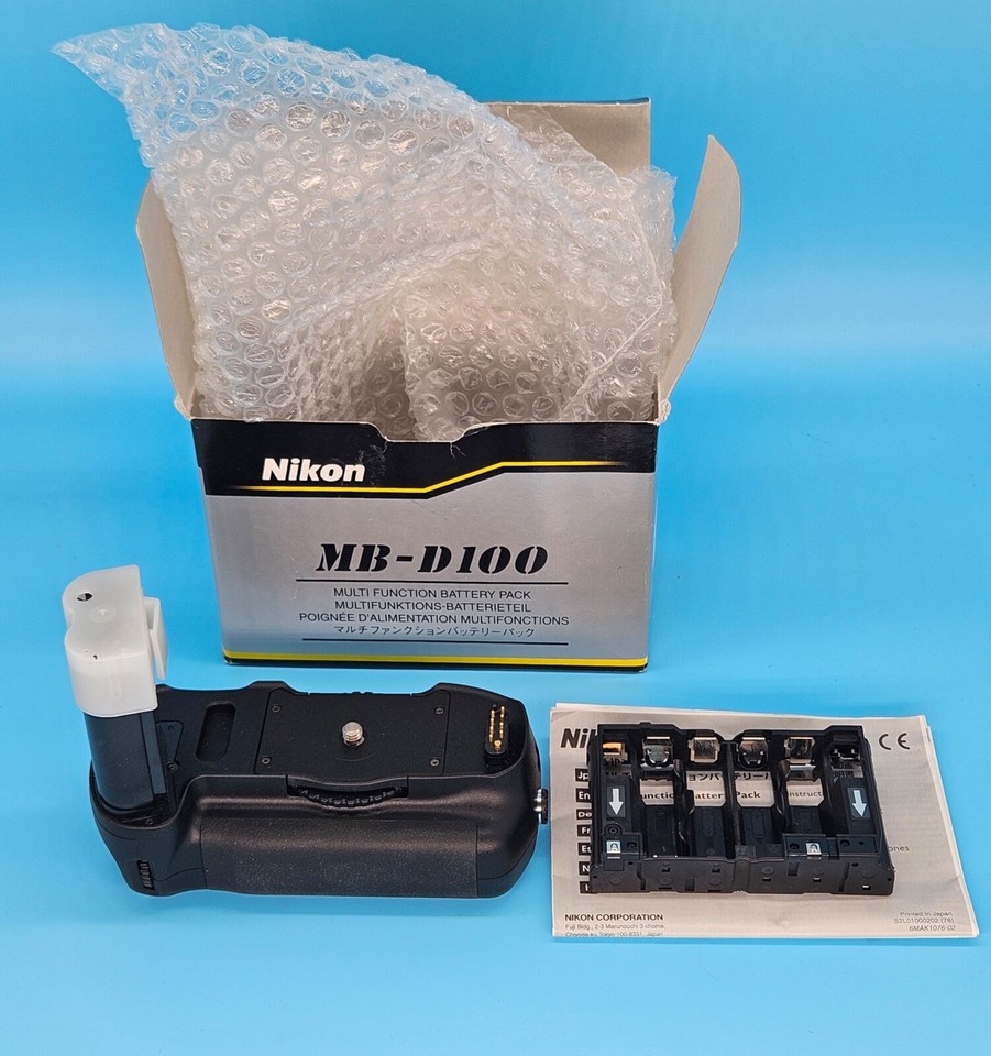 NEW Genuine Nikon MB-D100 Multi Function Battery Pack Grip 0248479 | eBay