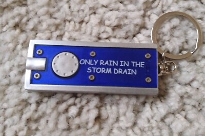 Blue Keychain Light "Only Rain in the Storm Drain" - Tested Working | eBay