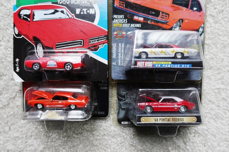 Lot of 4 RC Pontiac GTO (3) & Firebird (1), carded | eBay