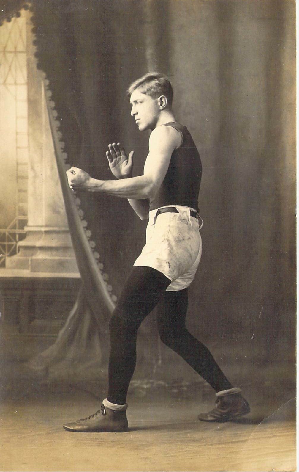RPPC post card of a Victorian era bare fisted boxer training to fight ...