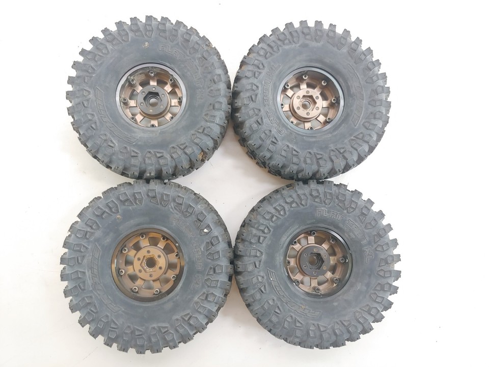 4x Proline Flat Iron XL 1.9" Tires on Bronze Metal 12mm Hex Beadlock ...