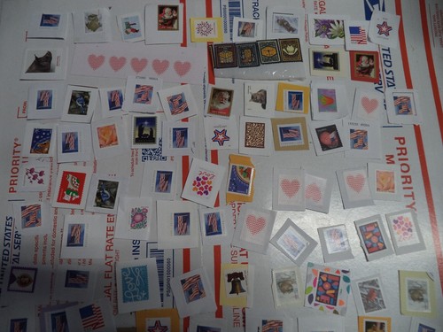 100 FOREVER 63¢ US POSTAGE STAMPS NOT USED AS INTENDED PURPOSE ON PAPER ...