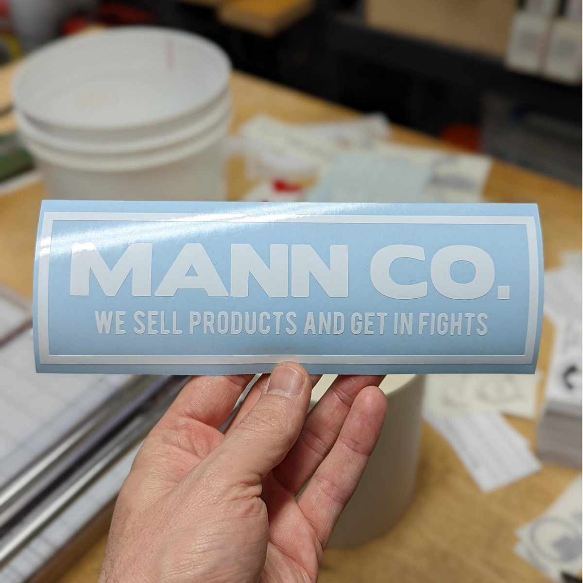 Mann Co Logo
