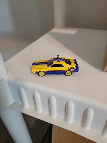 JOHNNY LIGHTNING 1968 AMC AMX IN BLUE AND YELLOW 'MFP' FROM MAD MAX | eBay