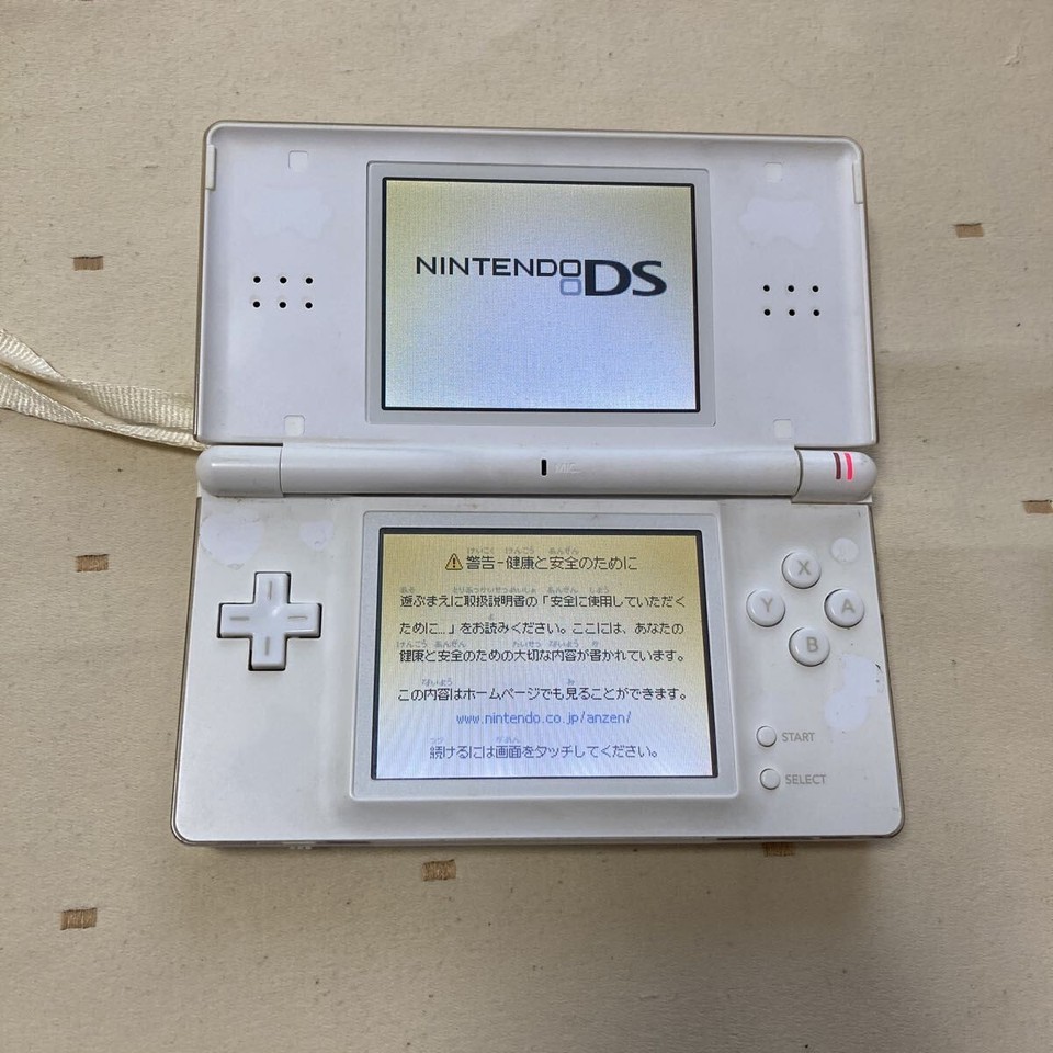 Nintendo DS Lite Crystal White Console with 2 Games | eBay