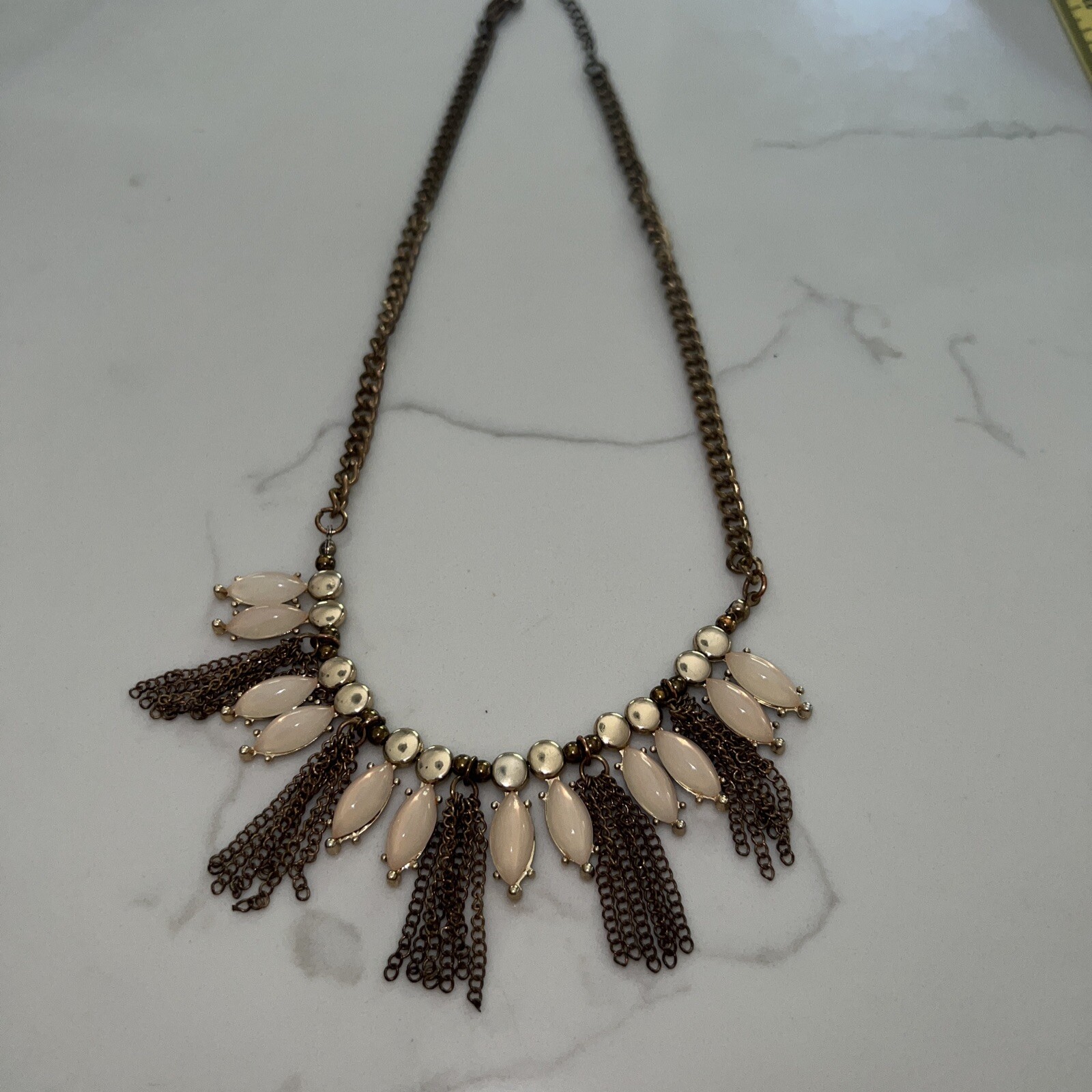 Peach Marquee Stones And Brass Chains Dangling On A 19”gold tone ...