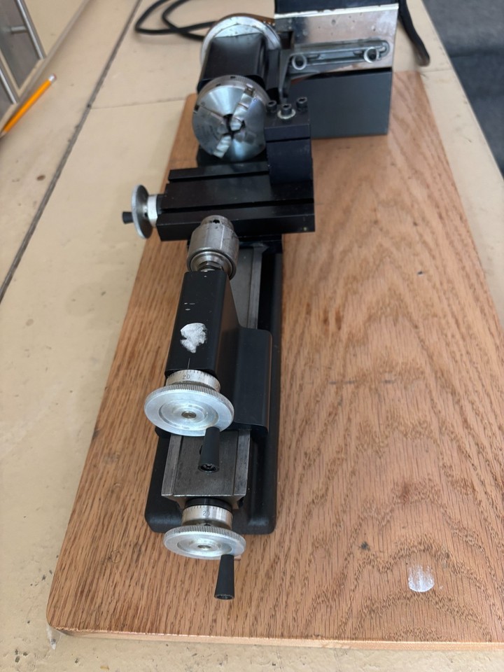 Lathe includes 3 jaw chuck and jacobs chuck and a block to mount ...