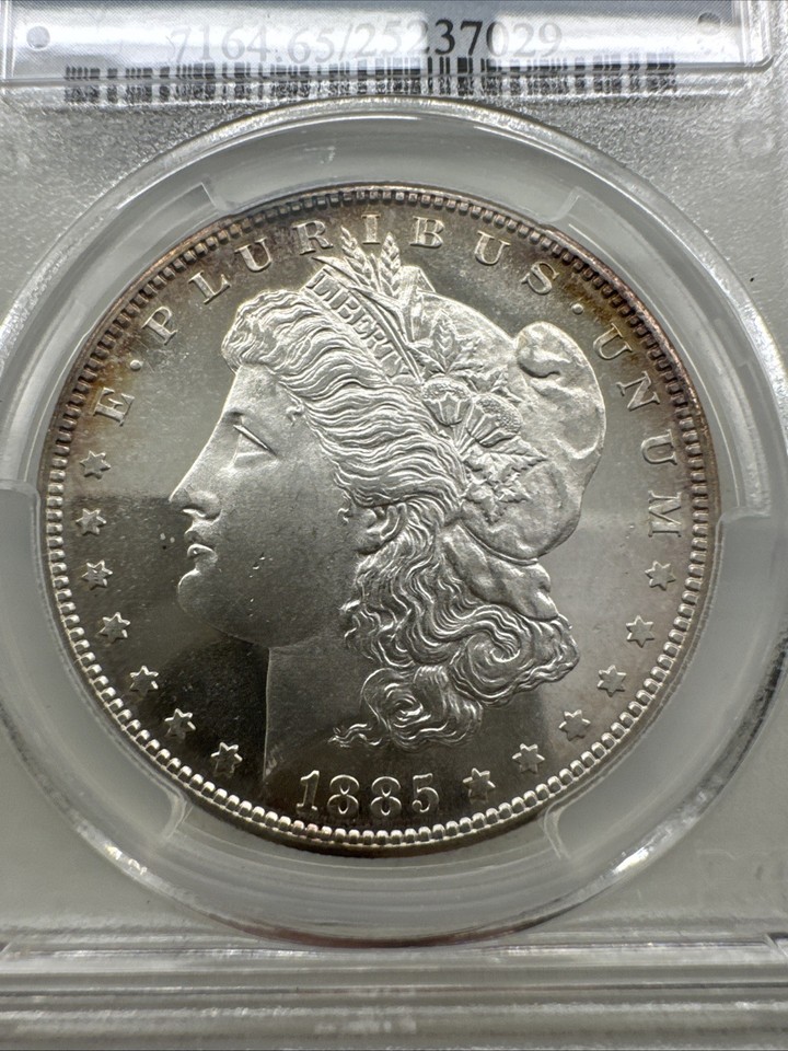 1885-S PCGS MS65. $1 Morgan POP 684 Only 171 Higher Rainbow Edge Toning ...