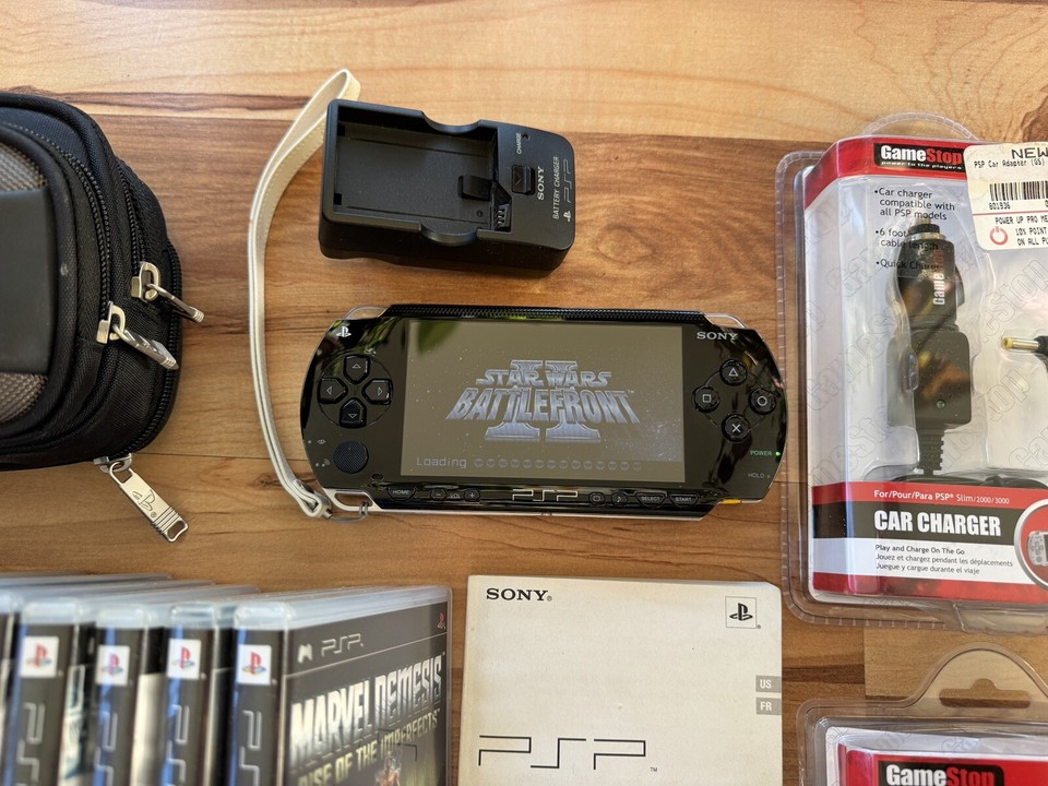 Near mint Sony PSP 1001 Console & Games movies cords case new battery ...