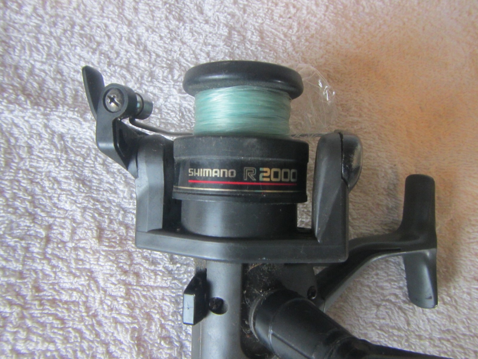 Lot of 2 shimano open face fishing reels 2000 & R2000 | eBay
