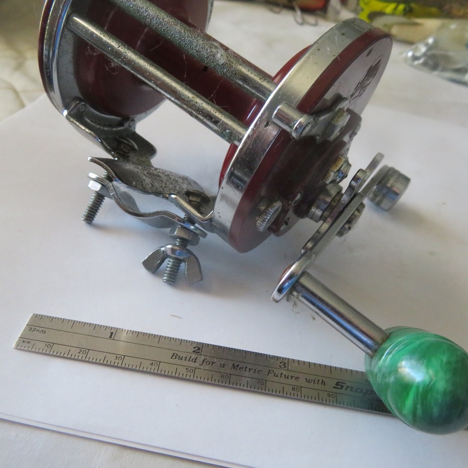 FISHING REEL PENN JIG-MASTER 500 WITH ROD CLAMP SMOOTH RUNNING SOME ...