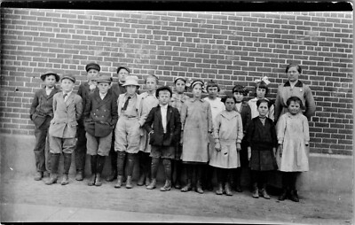 RPPC Schoolchildren and Teacher Brick Wall approx 1920s | eBay