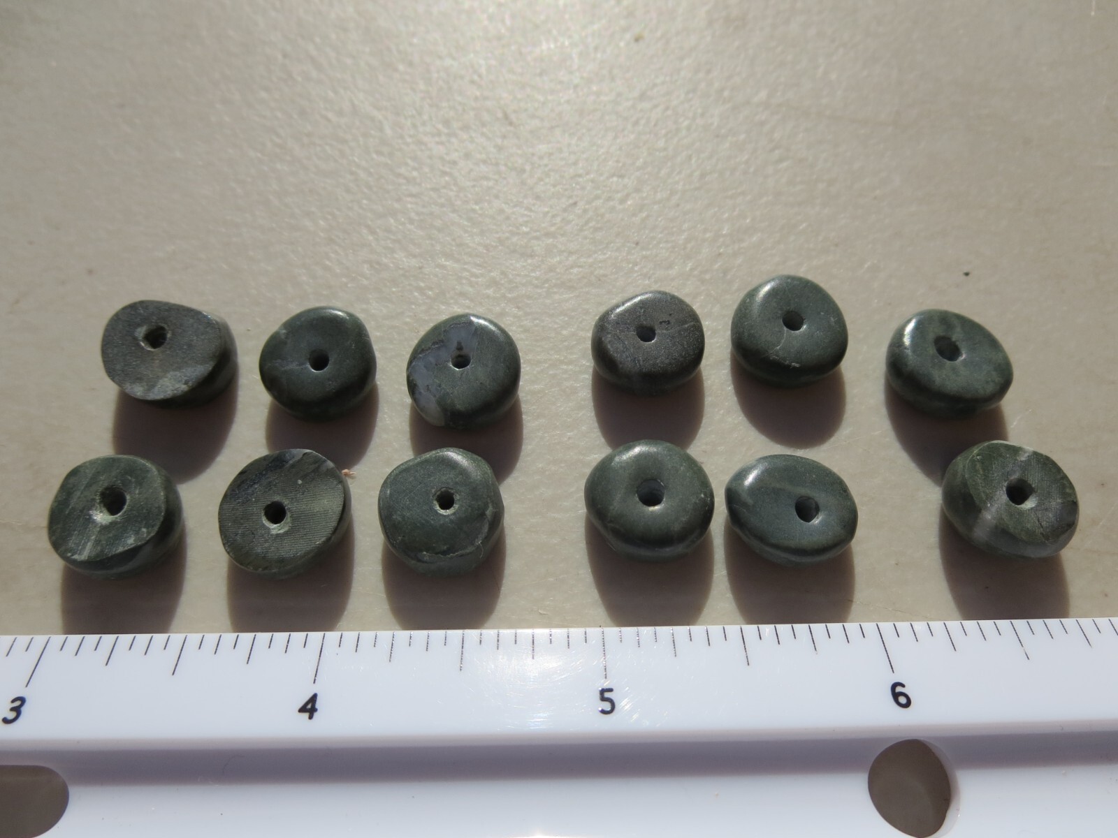 957 HAND ROLLED ELY GREENSTONE BEADS. ELY, MN. 2,700,000,000 YEAR OLD ...