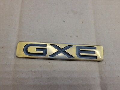 Nissan OEM 1993-1998 Quest GXE Gold Emblem Badge Logo Nameplate Name ...