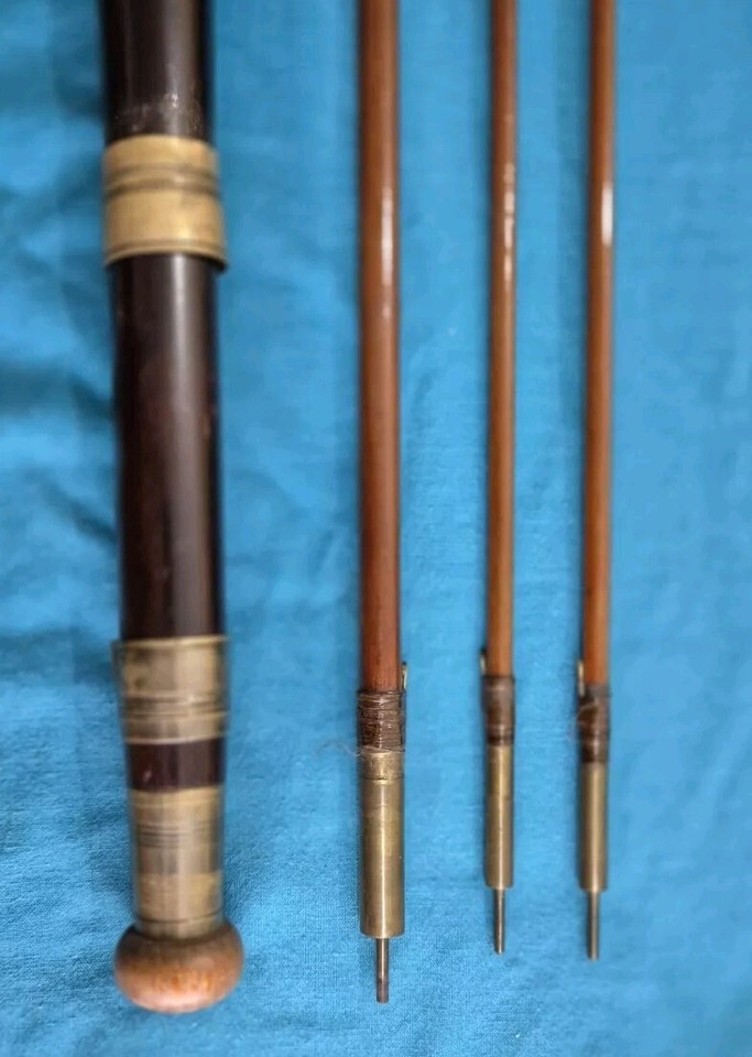 A EARLY VINTAGE 10FT 3 PIECE FLY ROD WITH 2 TIPS IN AGE RELATED CLOTH ...