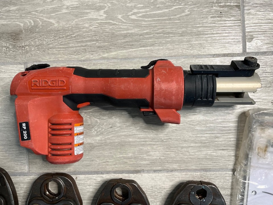 Ridgid RP 200-B Compact press tool 1 battery 1 charger 4 jaws, and the ...