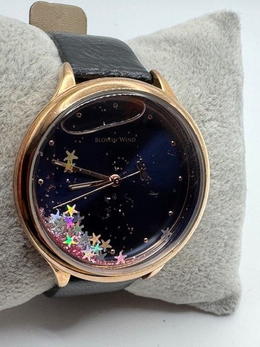 RARE Ladies Blowin' Wind Gold Tone Falling Stars Dial Quartz Watch New ...