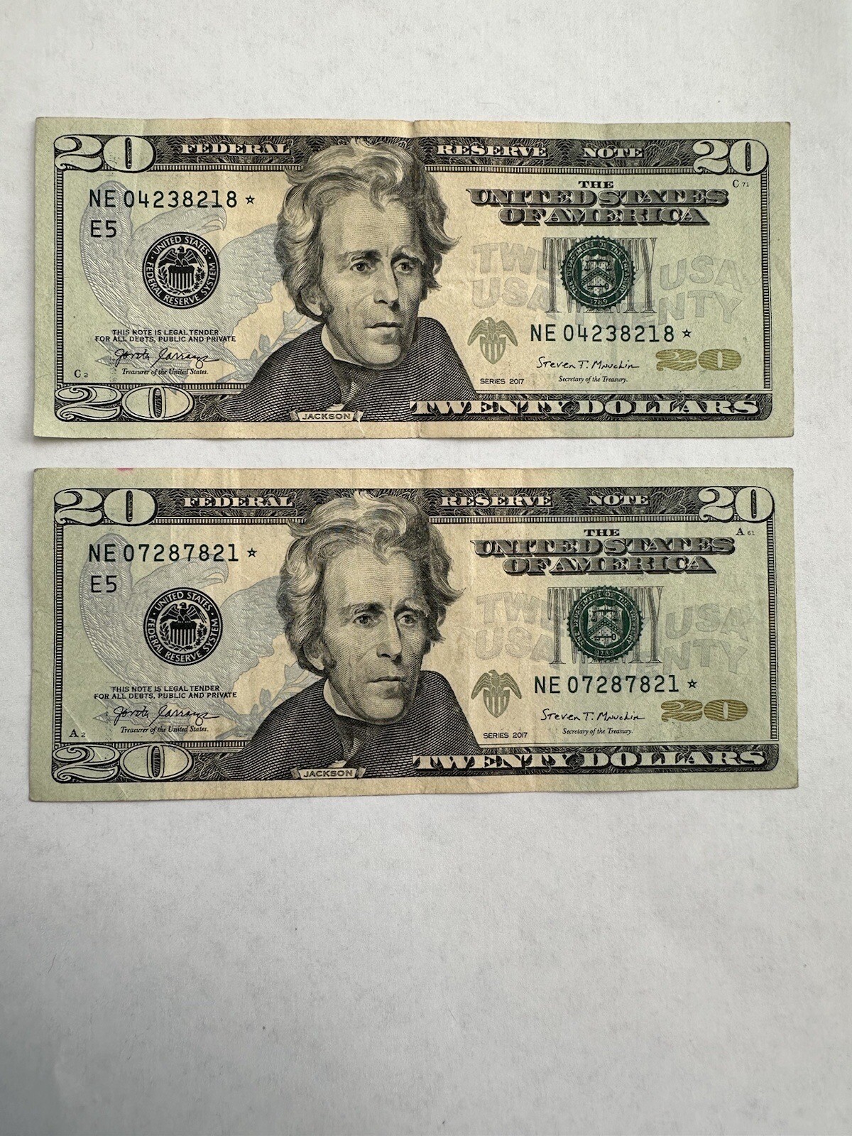 Two used $20 Star Note bills from the SERIES 2017 #'s NE04238218 ...