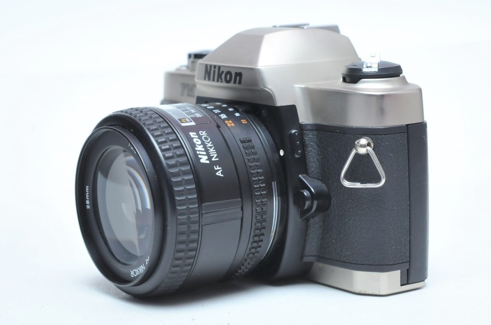 Nikon FM-10 SLR Film Camera W/Wide-Angle 28mm F2.8D Lens | eBay
