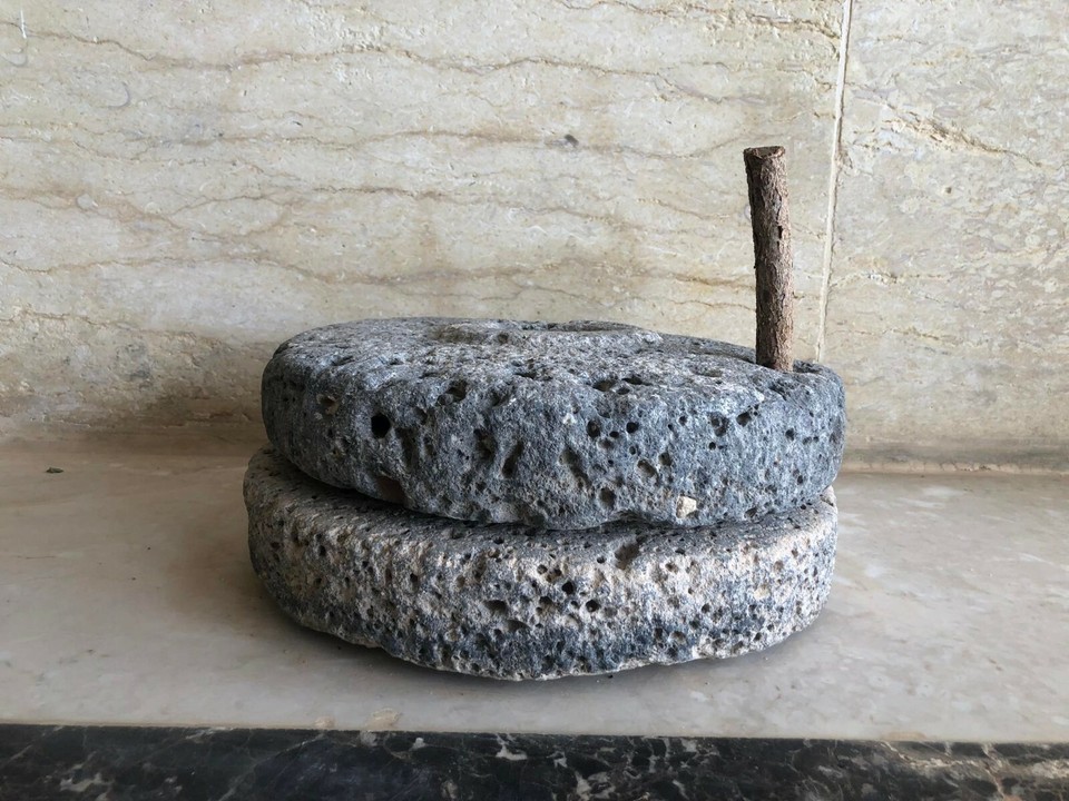 ancient millstone Wheat grinding and seeds grainmill quern stone tribes ...