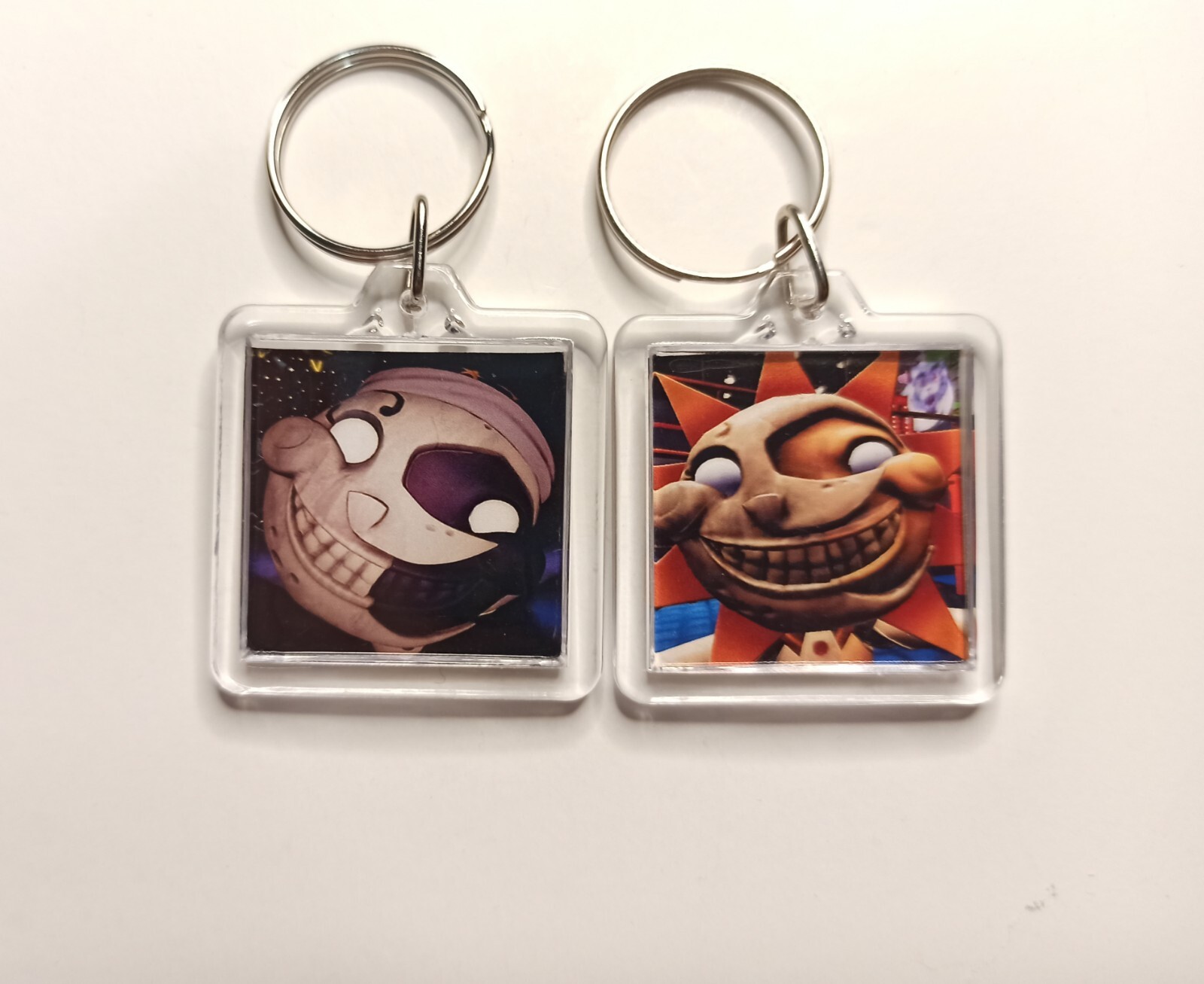 Sundrop Moondrop FNAF security breach keychain 1 peice Front and back ...