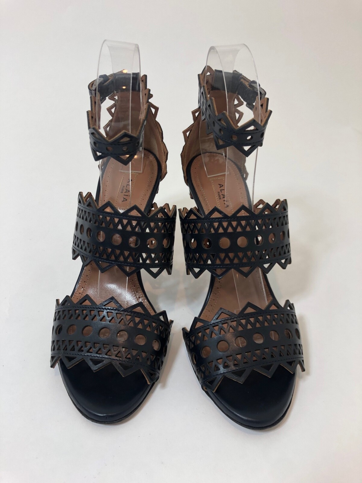 ALAÏA Leather Laser Cut Ankle Strap Sandals in Black … - Gem