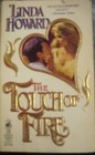 The TOUCH OF FIRE - Mass Market Paperback By Howard, Linda - VERY GOOD ...
