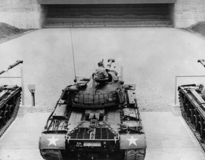 Tank gunner a M48 tank aims one tiny targets travelling 50 mph - 1957 ...