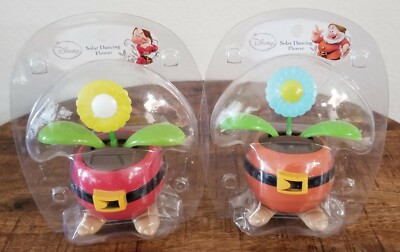 Disney Dwarfs Grumpy and Doc Solar Dancing Flowers - Lot of 2 | eBay