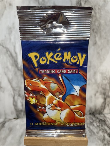 CHARIZARD of 1999 Pokemon Base Booster Pack Sealed Unopened long crimp ...