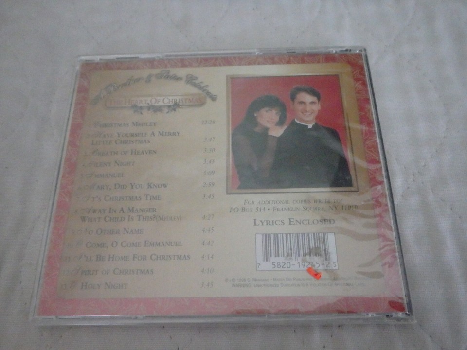 Brother & Sister Celebrate the Heart of Christmas by Mangano, Father ...