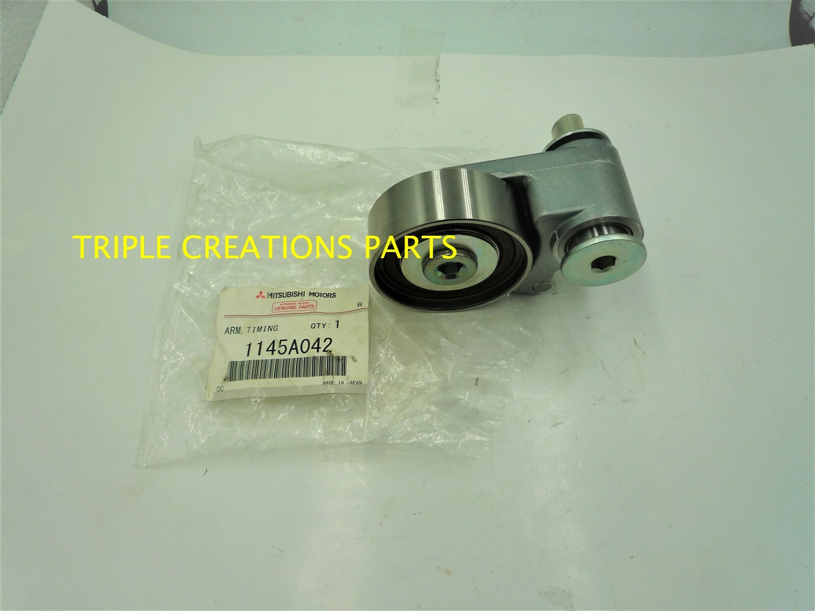 Genuine OEM Mitsubishi 1145A042 ARM TIMING BELT TENSIONER | eBay