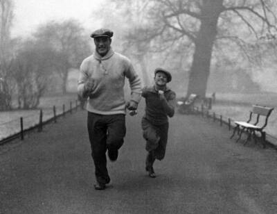 Italian heavyweight boxer Primo Carnera runs St James park during ...