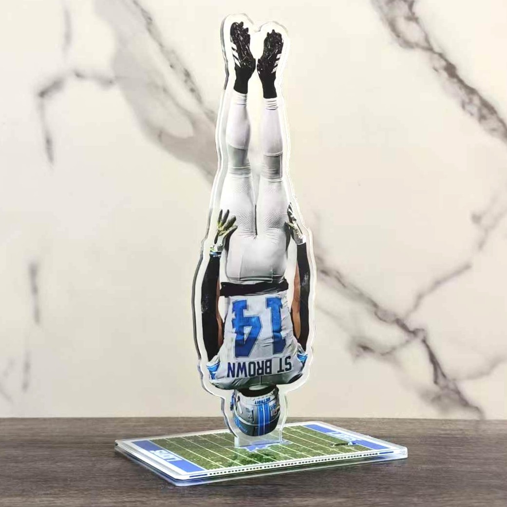 Amon-Ra St. Brown Headstand Celebration Standee Lions collectible
