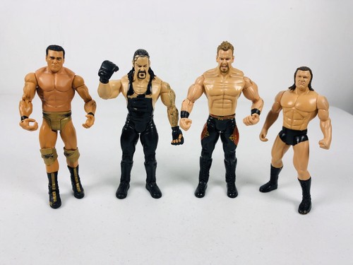 WWE Action Figures Lot Undertaker Triple H Christian Ruthless Alberto ...