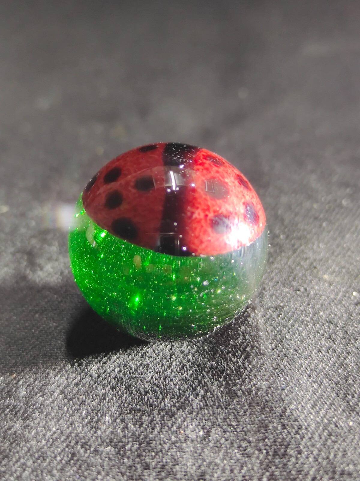 Ladybug on green small handmade borosilicate glass marble.Dr Sawfish ...