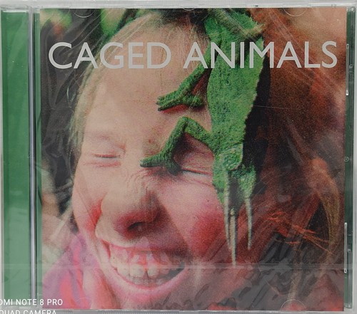 CD CAGED ANIMALS - IN THE LAND OF GIANTS neuf sous blister | eBay