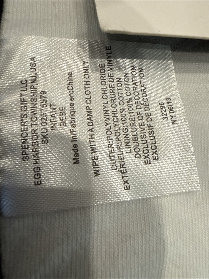 Spencer's Baby Bib Water Proof Vinyl Bib Tie & Skull Buttons One Size ...