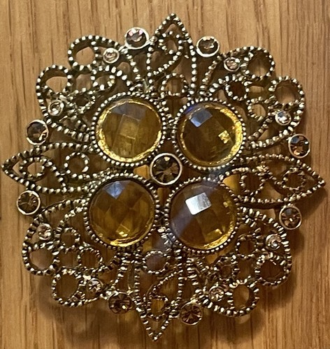 Vintage signed Round PD brooch with golden stones in gold tone metal ...